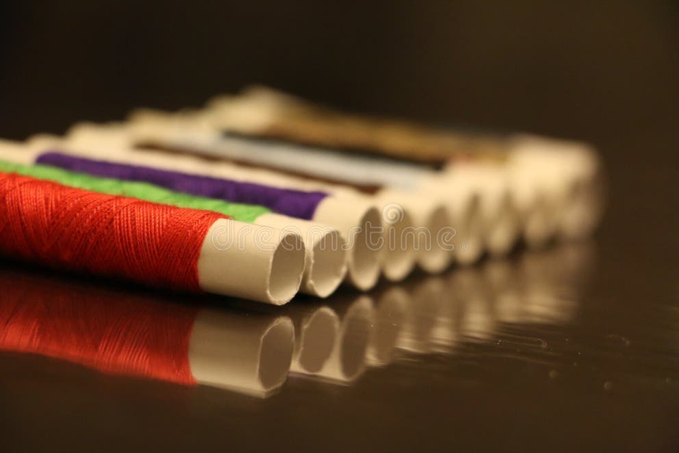 Threads Roll and Reflection Stock Image - Image of colored, tread: 81353339