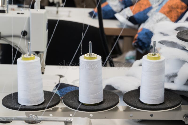 Threads. Shop Tailoring. Apparel Manufacturing. Thread on the Sewing ...