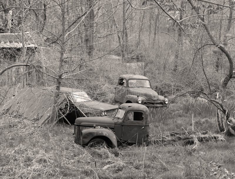Three Abandoned Vehicles in the Field Stock Photo - Image of vehicles ...