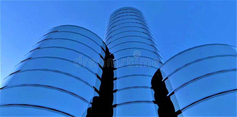 Three Abstract Round Towers of Different Heights with a Glass Facade ...