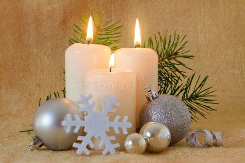 Three advent candles. stock image. Image of snowflake - 27710359