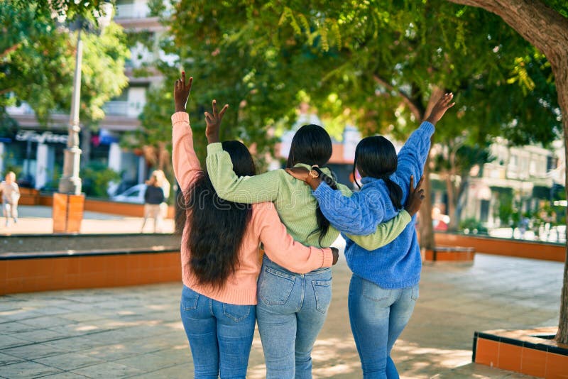 Three African American Friends on Back View Walking at the Park Stock ...
