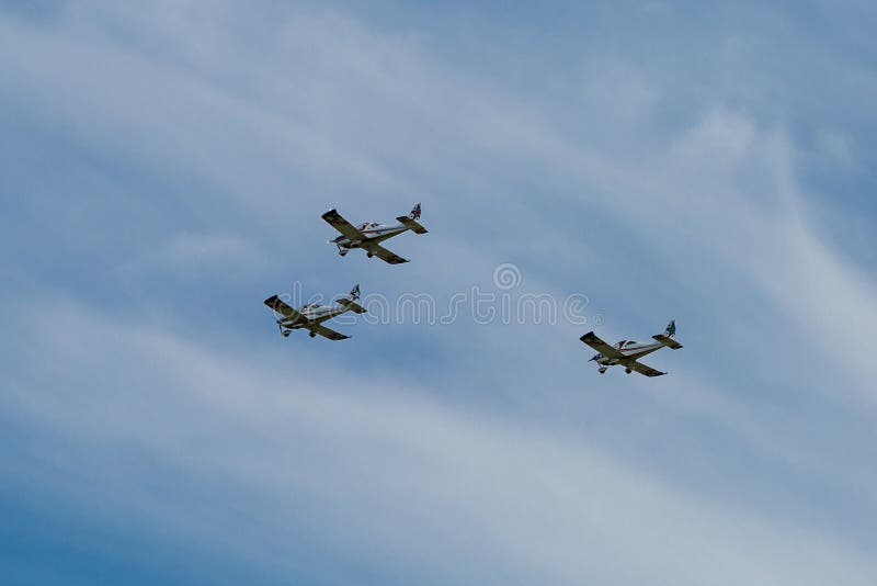 Three Airplanes Flying on Airshow, Performance, Skill and Teamwork ...