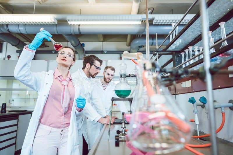 Three Analytical Chemists Doing Research in the Lab Stock Image - Image ...