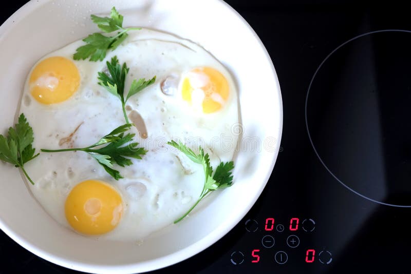 Three Appetizing Fried Eggs in the Pan Stock Image - Image of oven ...