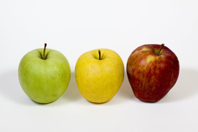 Three Apples on a Pile on White Background Stock Photo - Image of ...