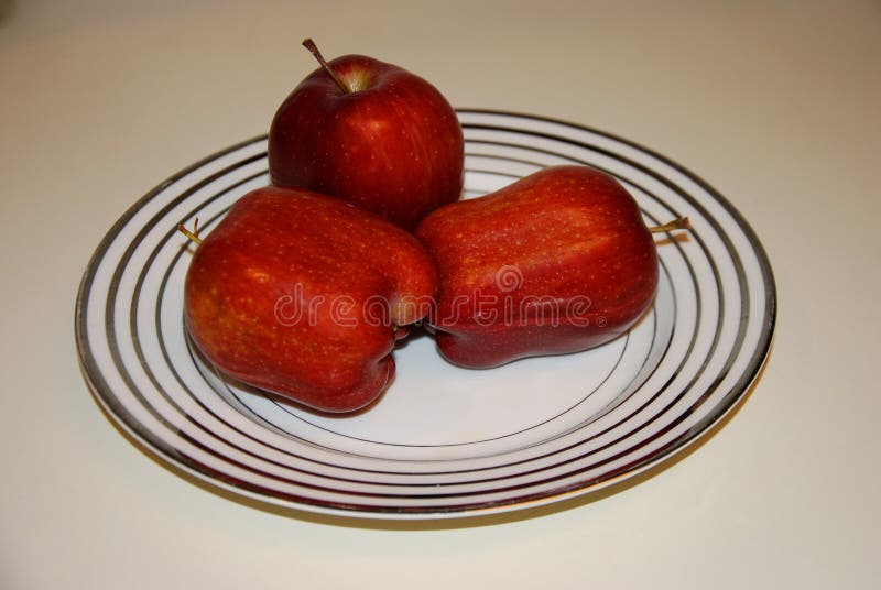 Three apples on plate stock photo. Image of fruit, retro - 56917068