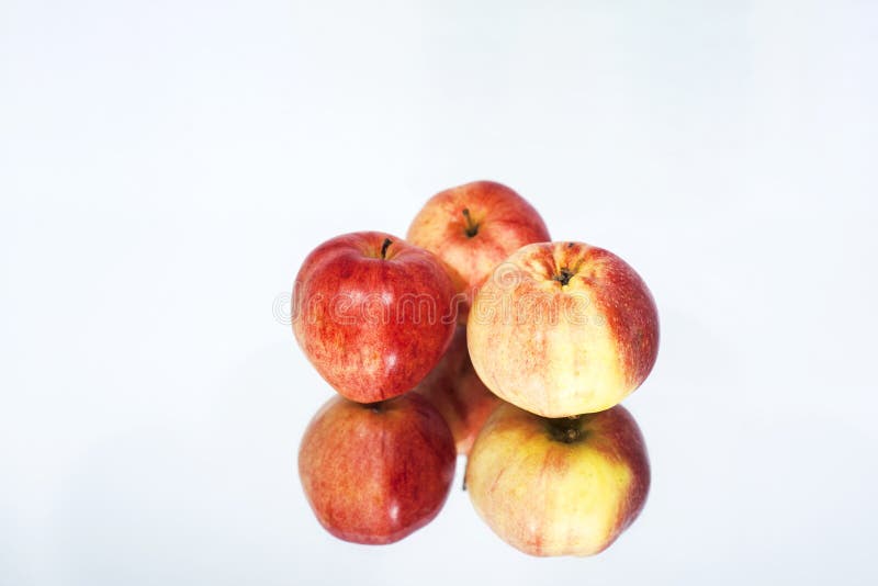 Three Apples on Table with Reflection. Autumn Abstract Photo Stock ...