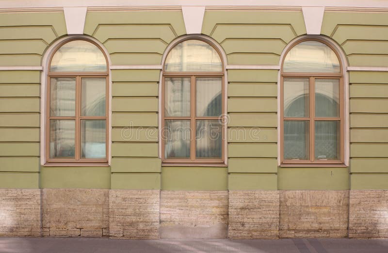 Three Arched Windows on the Ground Floor of the House Stock Photo ...
