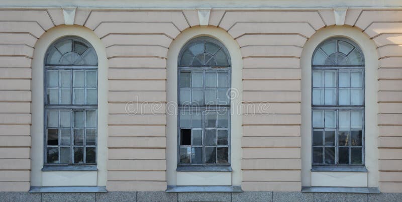 Three Arched Windows on the Ground Floor of the House Stock Photo ...