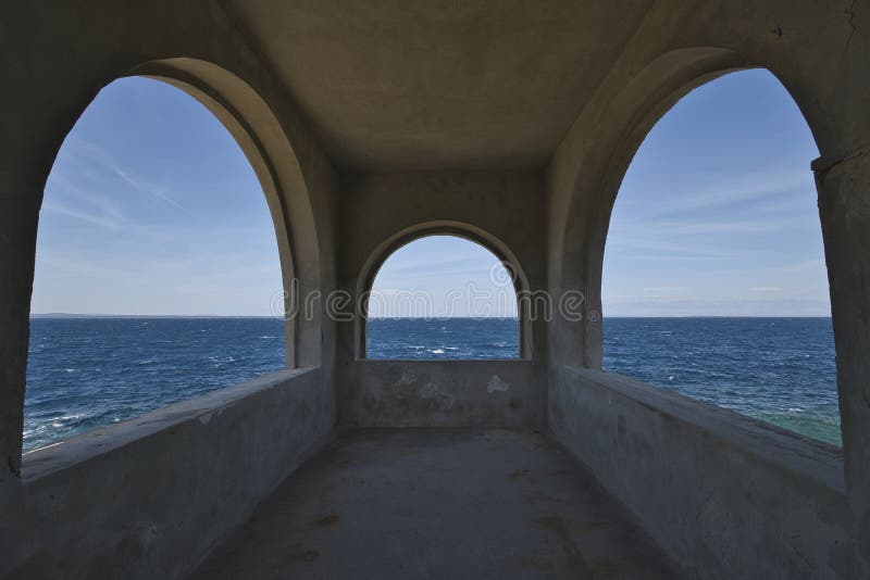 Three Arched Windows Overlooking the Sea Stock Image - Image of ...
