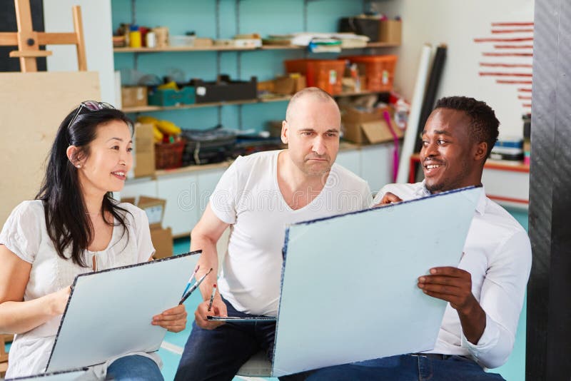 Three Art Students in a Painting Class Stock Photo - Image of education ...