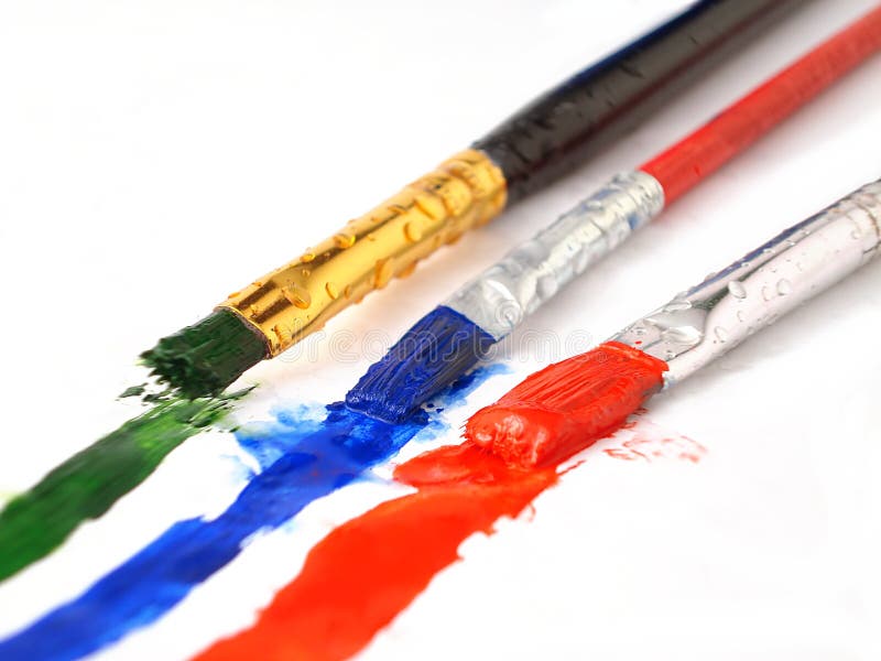 Three Artists Brushes with Colorful Paint Stock Image - Image of paper ...