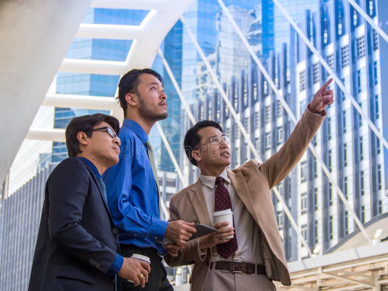 Three Asian Business Partners. Stock Image - Image of interesting ...