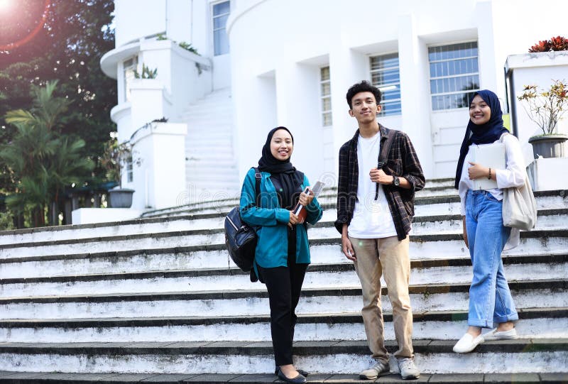 Three Asian College Student Pose in Campuss Stairs Stock Photo - Image ...