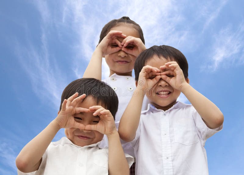 Three asian kids watching stock photo. Image of people - 19447632