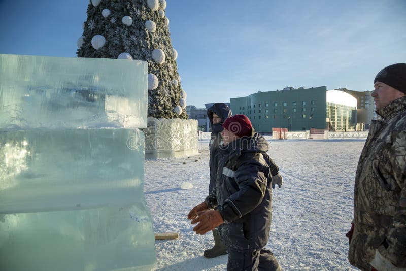Installers Store Ice Blocks for the Ice Town Stock Photo - Image of ...