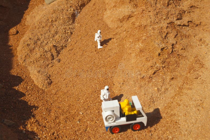 Three Astronauts Exploring Mars with a Vehicle, Concept Stock Photo ...