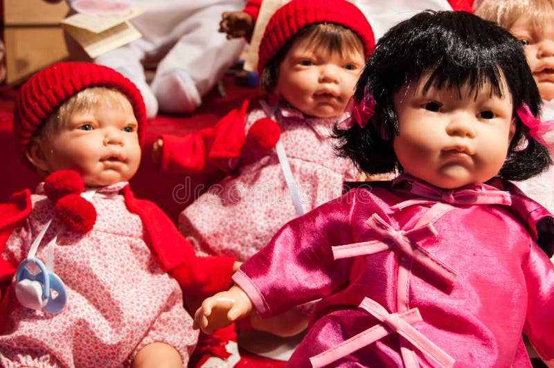 Three Baby Dolls in Colorful Clothes. Stock Photo - Image of girl, cute ...