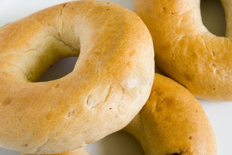 Three Bagels stock image. Image of jewish, piled, plate - 786661