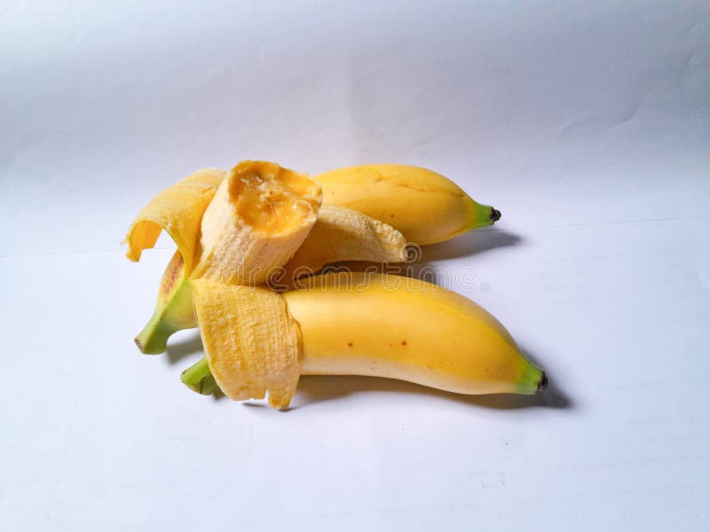 Three Bananas on Top of a White Bowl Filled with Granola Stock Image ...
