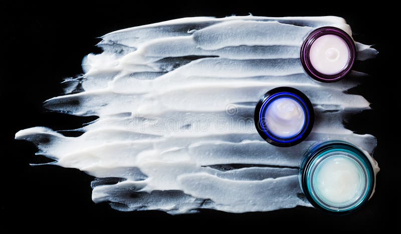 Three Banks of Face Cream on a Smeared Surface Stock Image - Image of ...