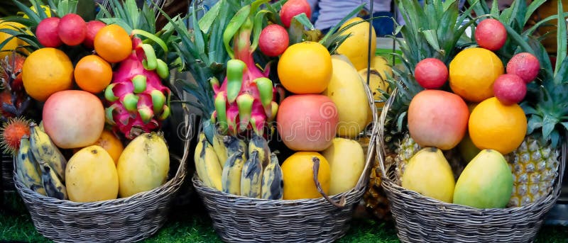 Three Baskets Full of Assorted Tropical Fruits Stock Image - Image of ...