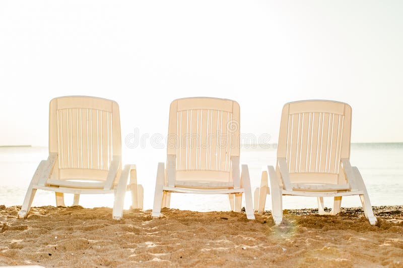 Three Beach Chair on Sand Beach Stock Photo - Image of lounge, outdoors ...