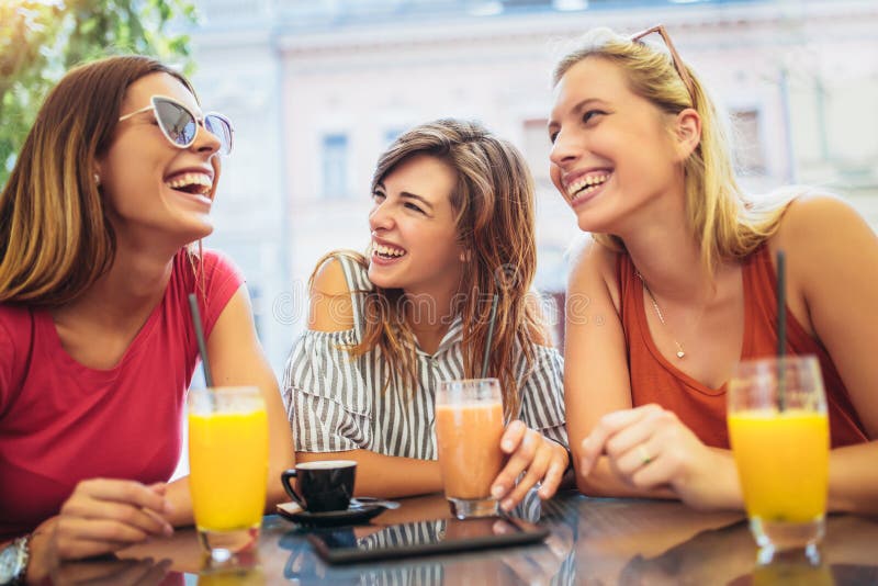 Beautiful Friends in a Cafe Having Fun Stock Photo - Image of casual ...