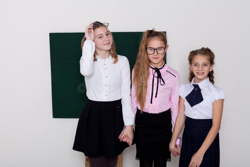 Three Beautiful Girls at the School Board in Class in Class Stock Photo ...