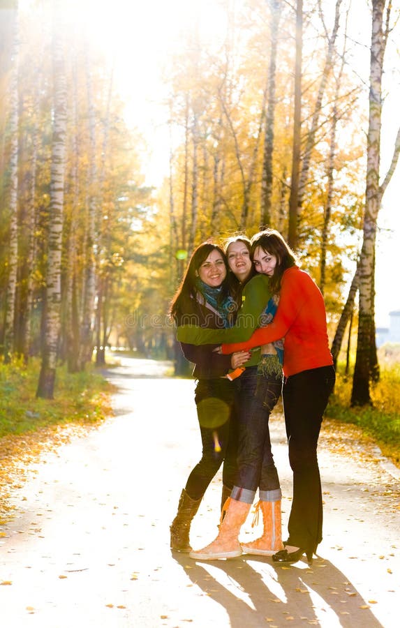 Three Beautiful Girls Standing on the Path in Park Stock Image - Image ...