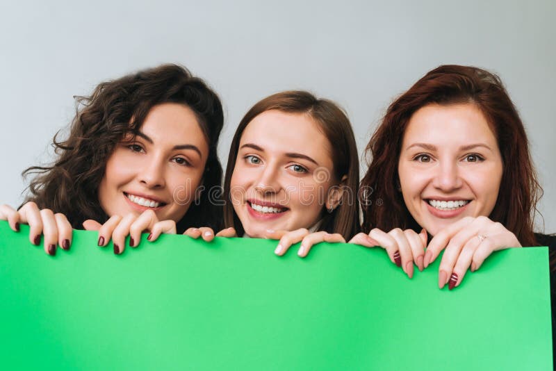 Three Beautiful Young Girls Posing for the Camera Stock Photo - Image ...