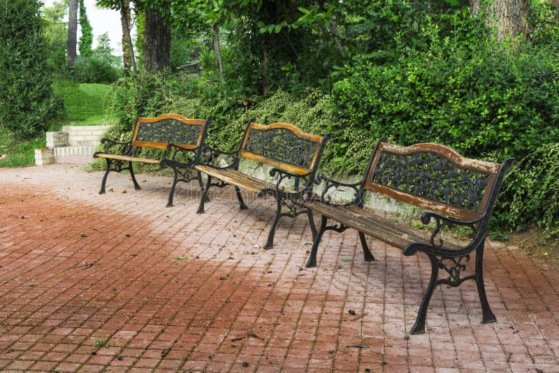 Three benches in a park stock image. Image of wooden - 62300703