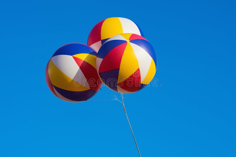 Three Big Balloons Flying Against Blue Sky Stock Image - Image of ...
