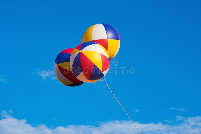 Three Big Balloons Flying Against Blue Sky Stock Image - Image of ...