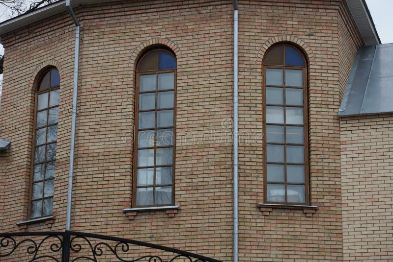 Three Big Windows on a Brown Bricks Wall Stock Image - Image of detail ...