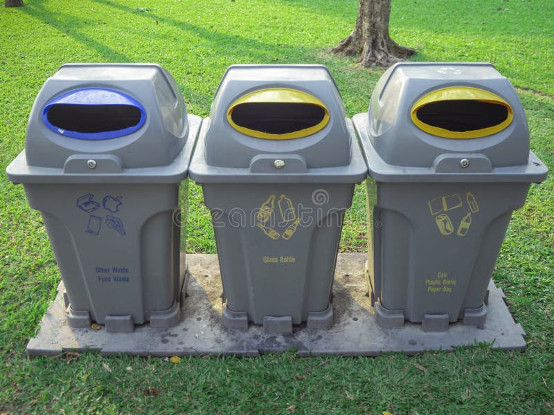 Three Bin in Fresh Green Park with Recycle , Reuse and Reduce Symbol ...