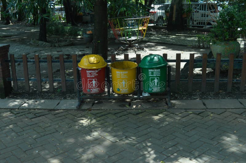 Three Bins with Three Different Colors for Different Types of Trash ...