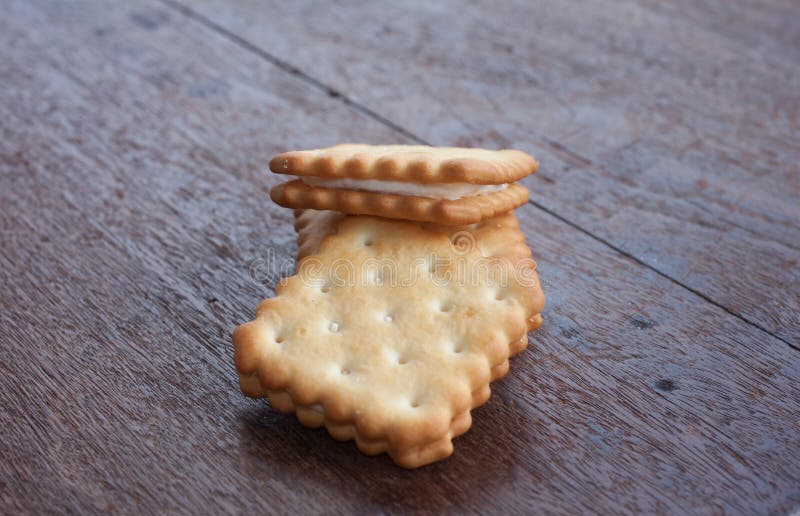 Three Biscuits on wood stock photo. Image of cookie, food - 45795748