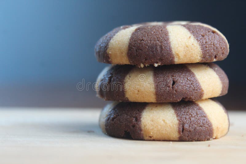 Three Biscuits on a Wooden Board Stock Image - Image of wooden, brown ...