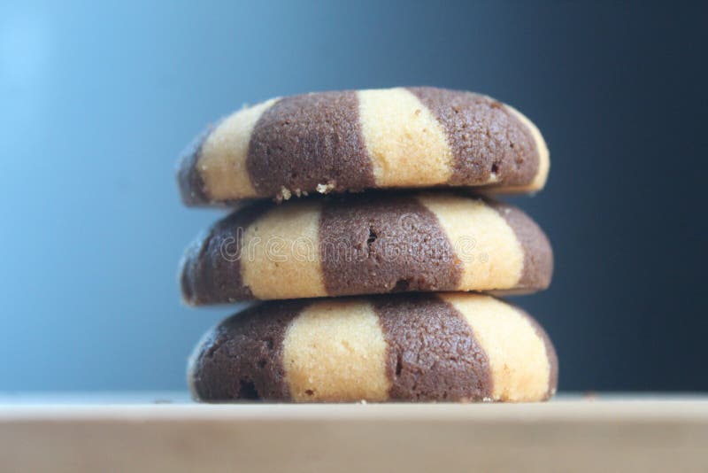 Three Biscuits on a Wooden Board Stock Photo - Image of tasty, cream ...