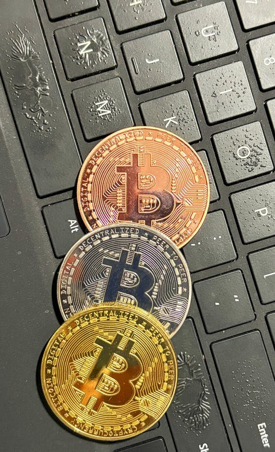 Realistic Bitcoin Coins Displayed on a Black Keyboard Showcasing ...