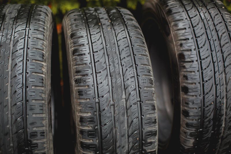 Three Black Car Tires Wheels Stock Photo - Image of macro, pattern ...