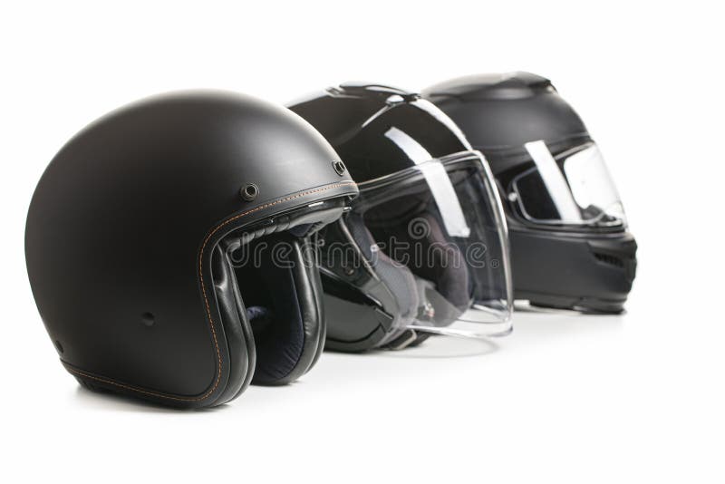 Three Black Motorcyle Helmets Stock Image - Image of headgear, driver ...
