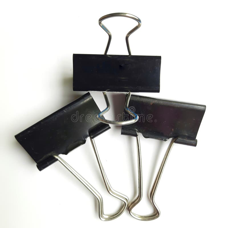 Three Black Paper Clips and Chart Clips Arranged Diagonally in White ...