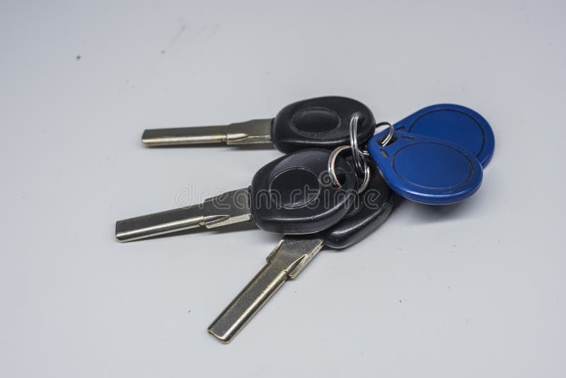 Three Black Room Keys and One Blue Access Card Stock Image - Image of ...