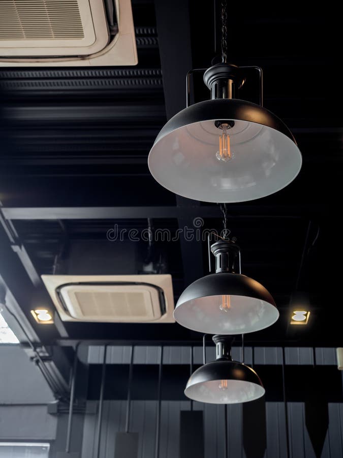 Three Black Round Modern Ceiling Lights and Cassette Type Air ...