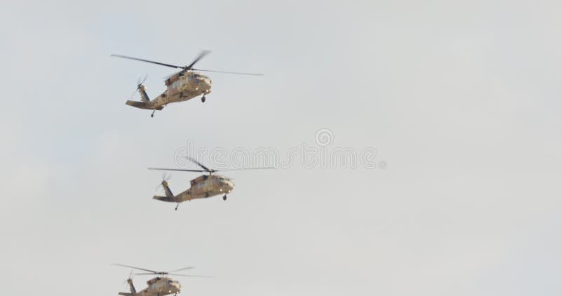 BlackHawk Military Helicopters Flying in Formation Stock Video - Video ...