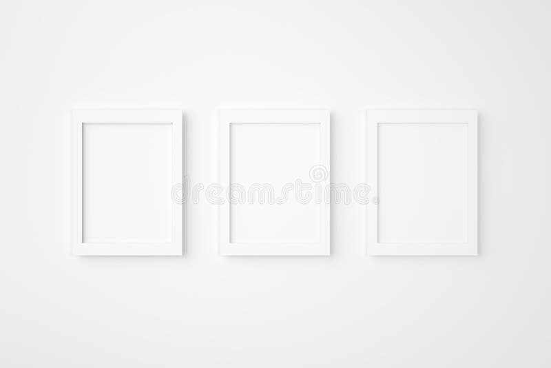 Three Blank or Empty Rectangle Picture Frames Hanging on White Wall ...