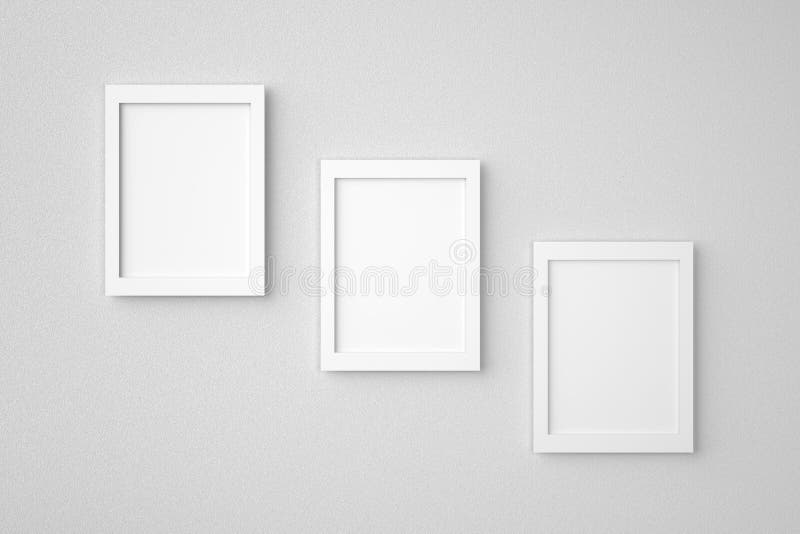 Three Blank or Empty Rectangle Picture Frames Hanging on White Wall ...